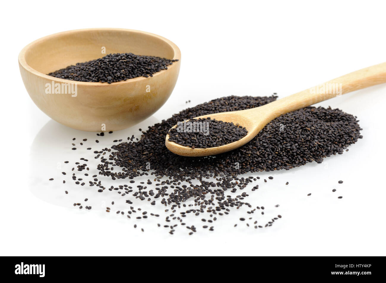 closeup heap of sweet basil seeds isolated on white background Stock ...