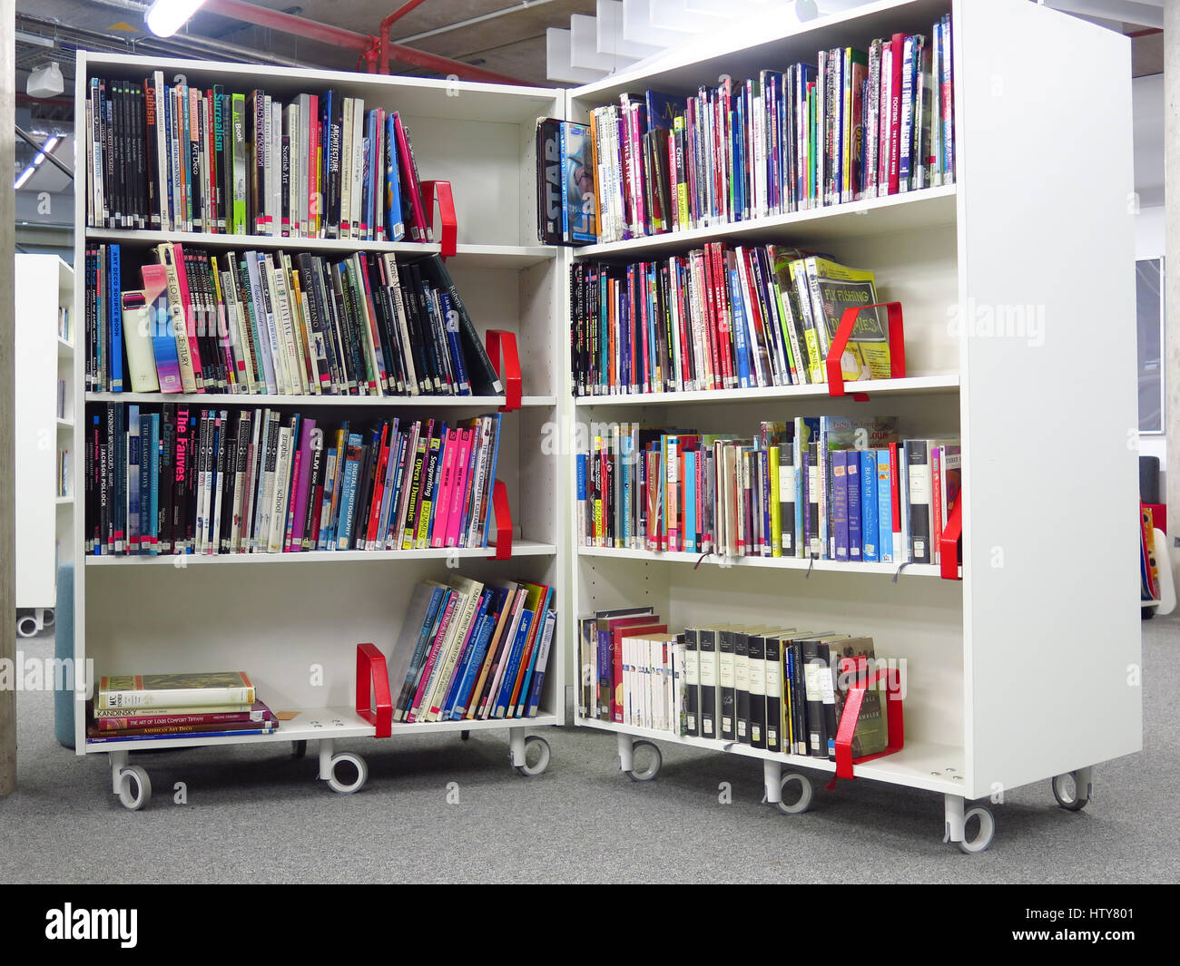 Library books in folding storage unit Stock Photo - Alamy