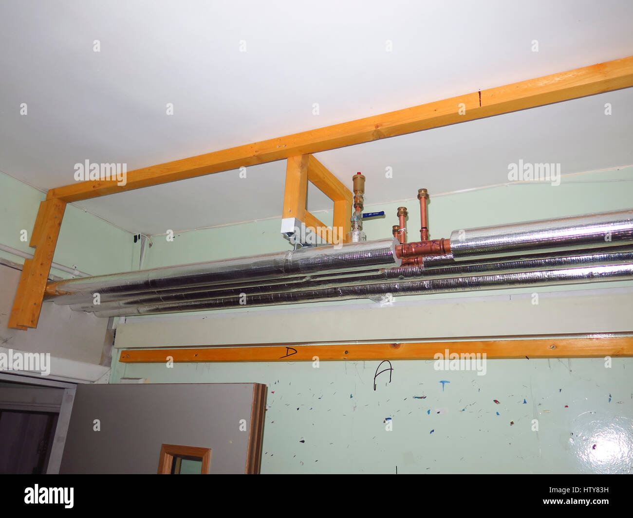 Pipework installation on construction site Stock Photo - Alamy