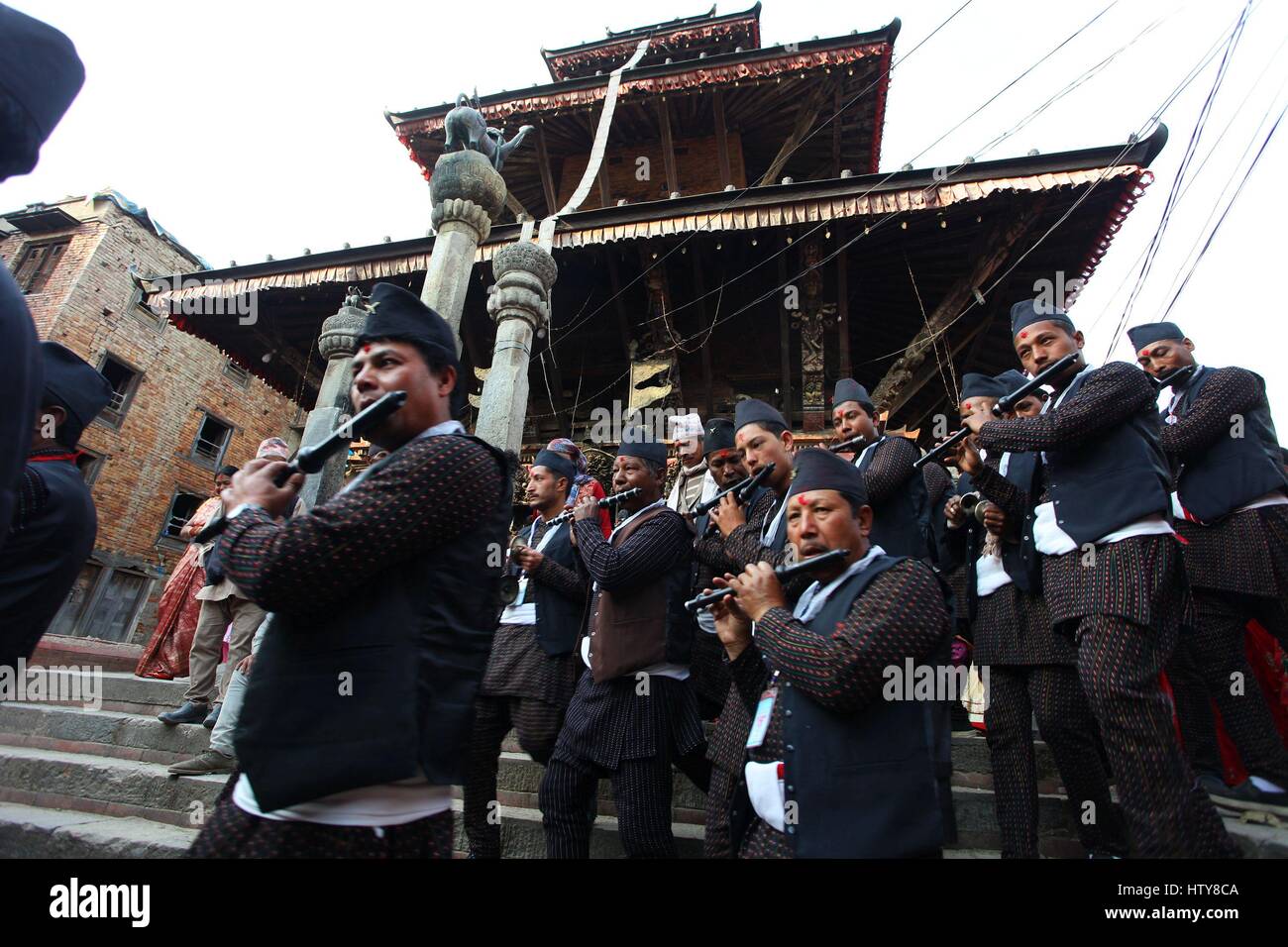 Nala, Nepal. 15th Mar, 2017. Devotees play religious hymns during the ...
