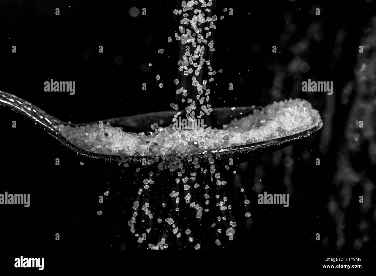 Spoonful sugar pouring hi-res stock photography and images - Alamy