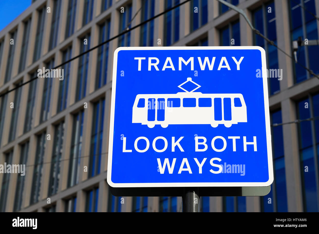 A Tramway warning sign informing members of the public to look both ...