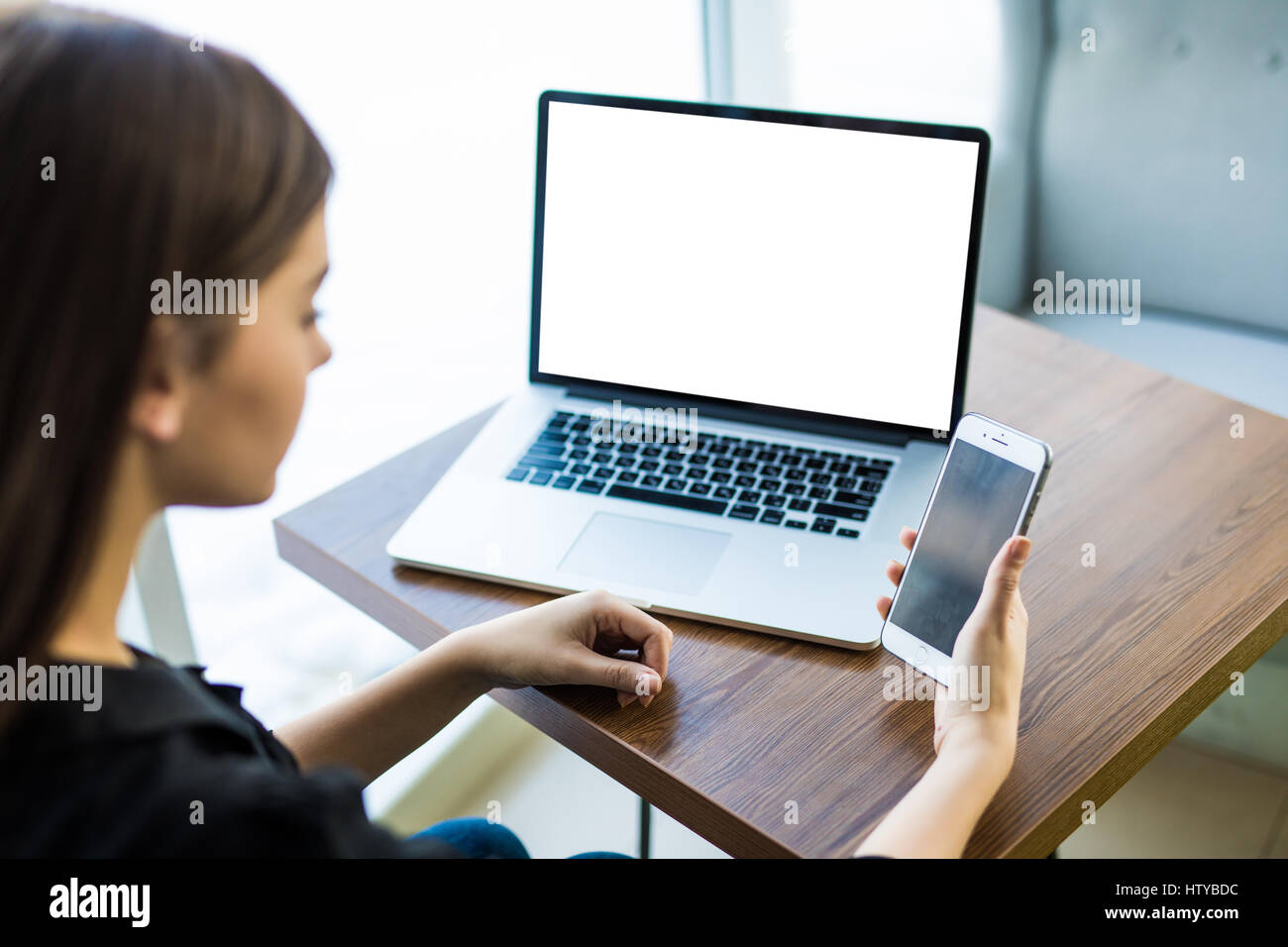 Top view,close-up of smartphone with blank screen in hands of young ...