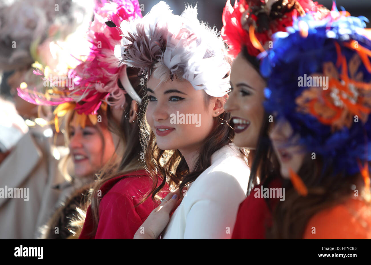 Female racegoers pose for photographers to the start of Ladies Day of ...