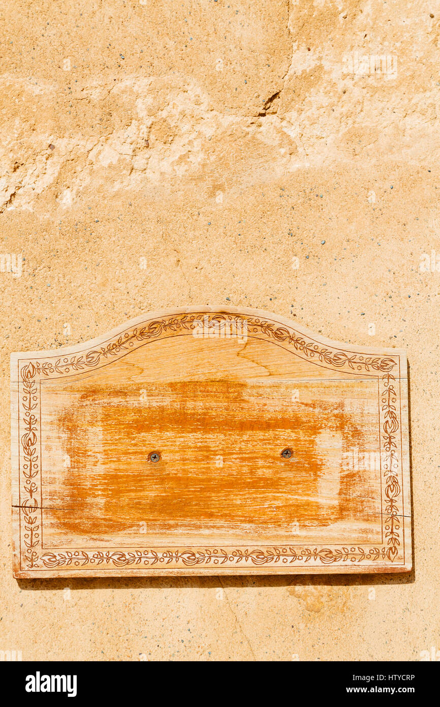 in a concrete wall the wooden vintage empty panel blank and abstract ...