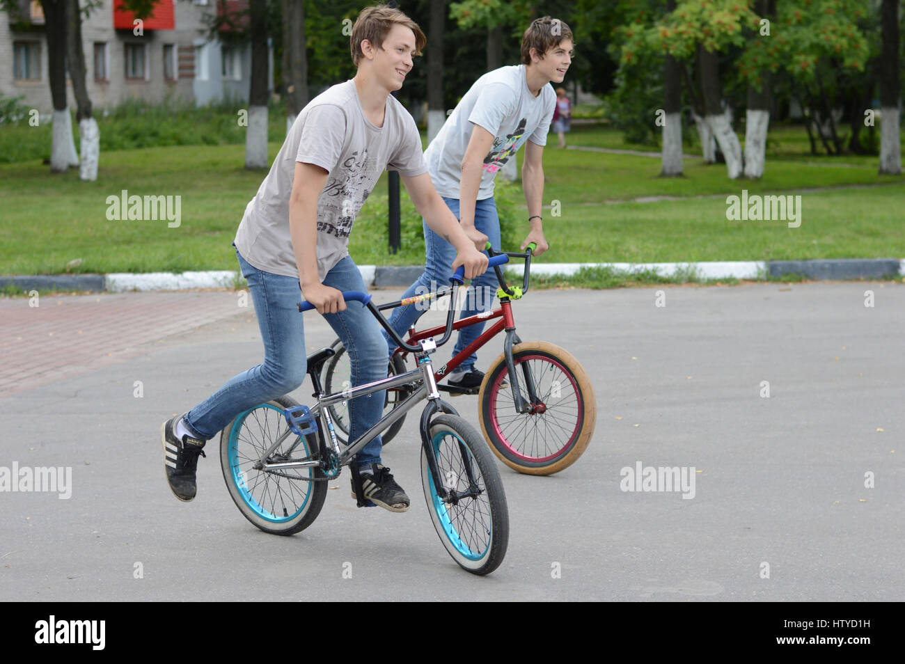 Boys ride bikes hi-res stock photography and images - Alamy