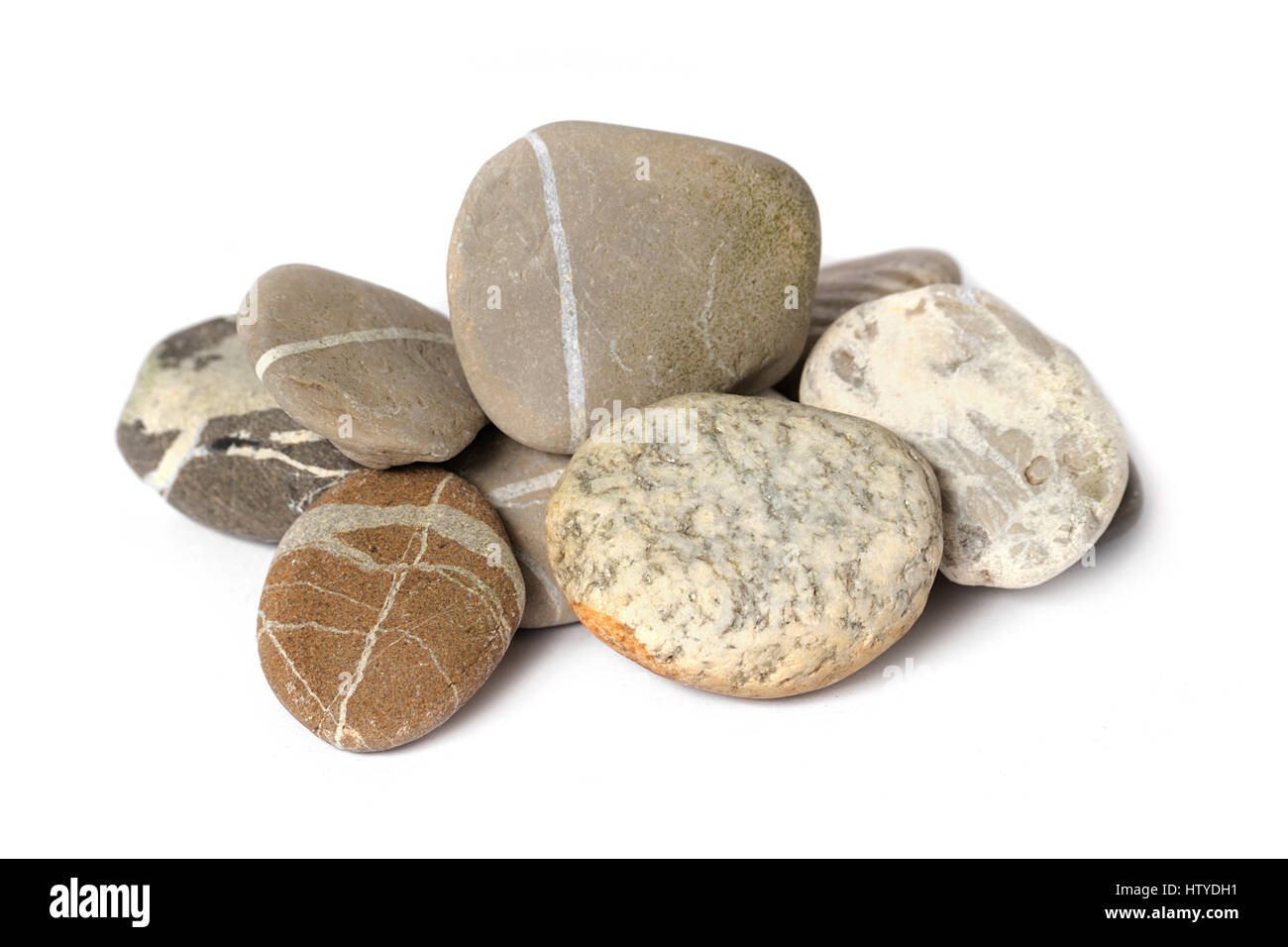 Several stones isolated over white Stock Photo - Alamy