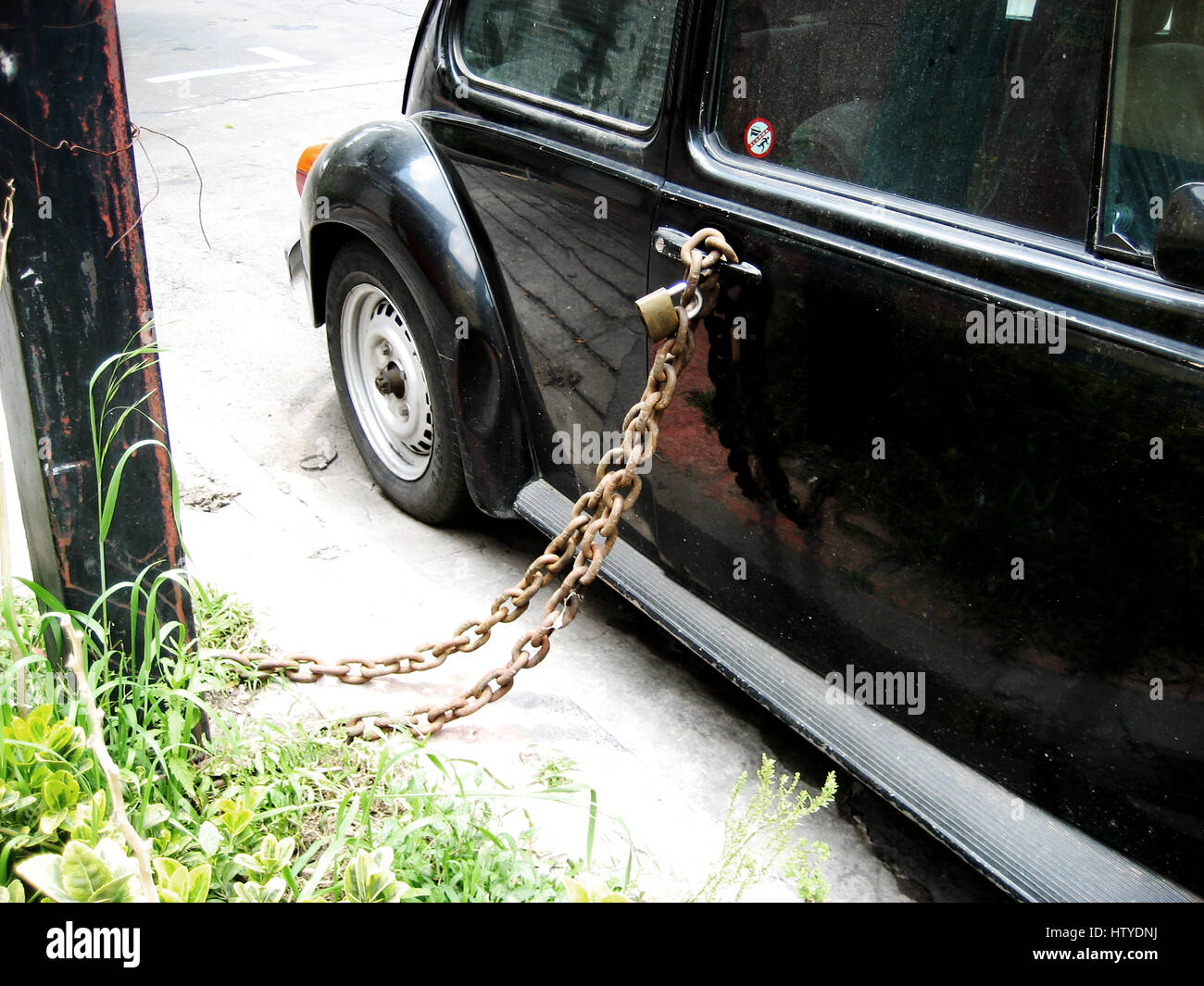 Chained car pictured in Mexico Stock Photo - Alamy