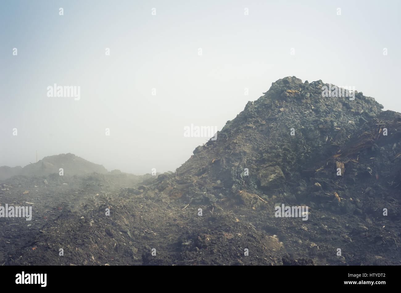 Landscape with fog over land Stock Photo - Alamy