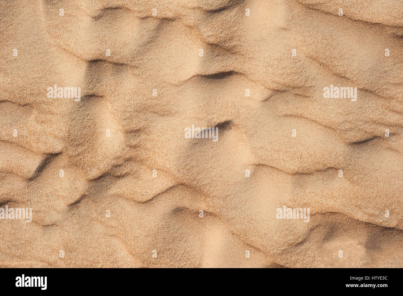 Closeup of sand pattern of a beach in the summer Stock Photo - Alamy