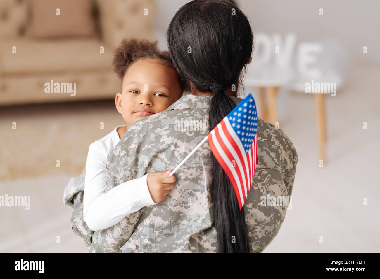 Emotional child really happy seeing her mother Stock Photo - Alamy
