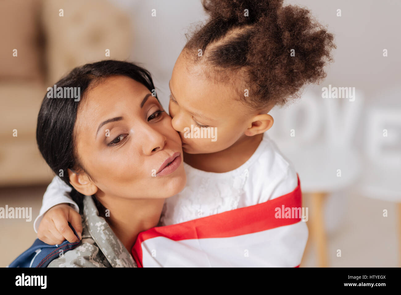 Kissing her mom hi-res stock photography and images - Alamy