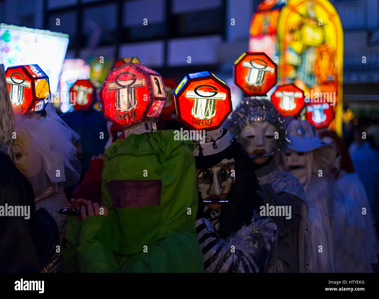 Basel carnival. Carnival participants with illuminated head lanterns ...