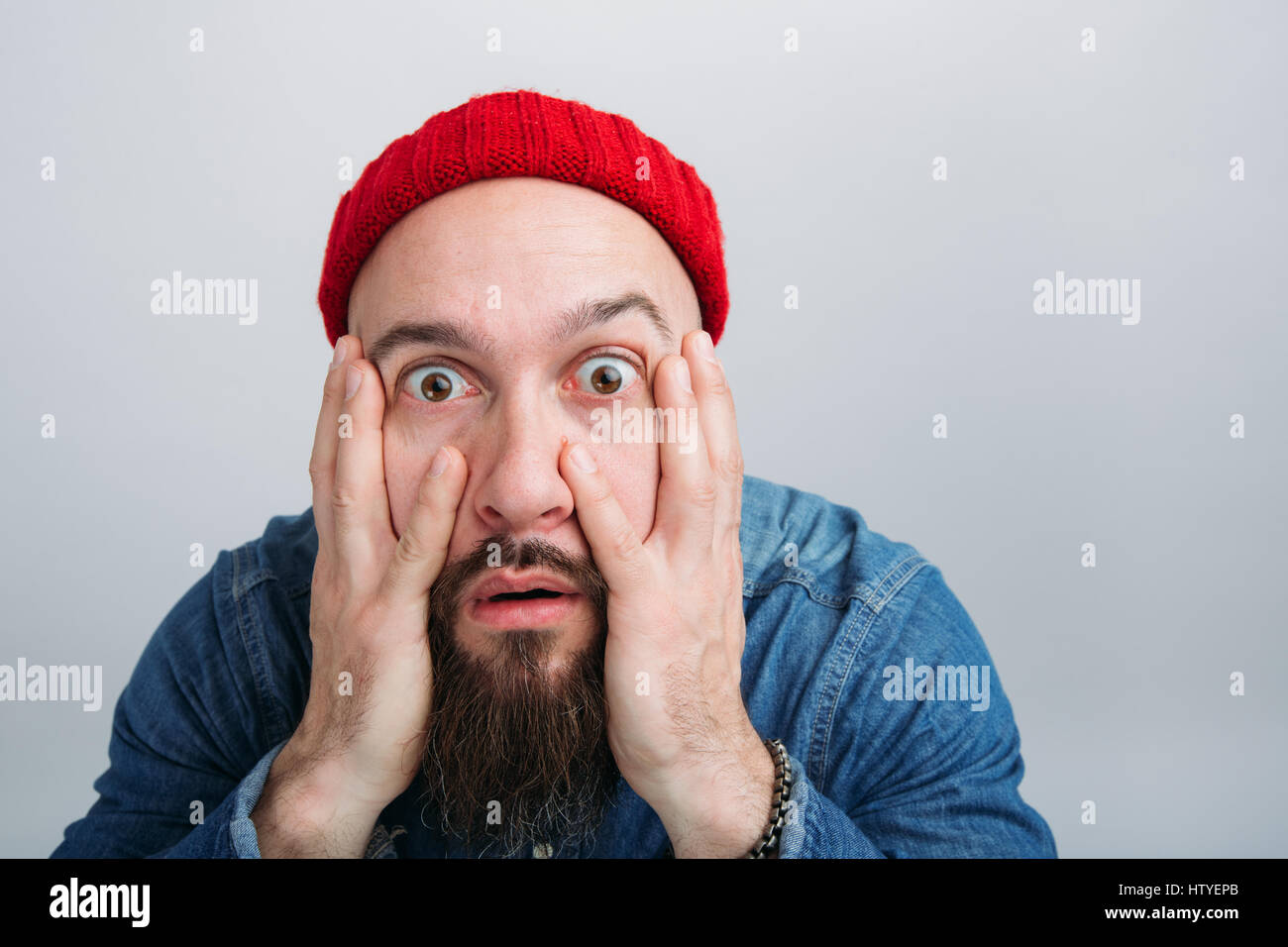 Portrait of scared man Stock Photo - Alamy