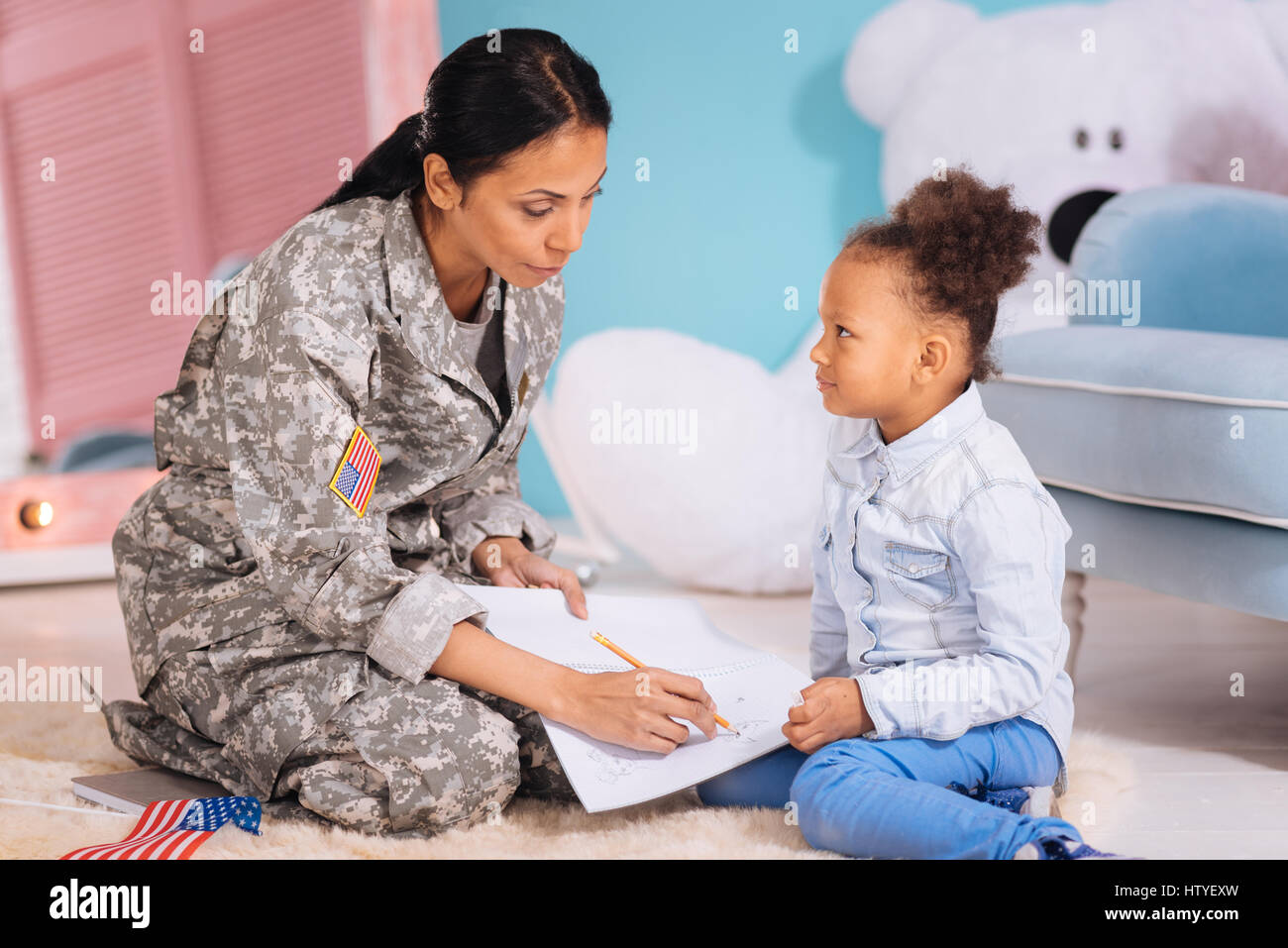 Two pretty smart ladies studying together Stock Photo - Alamy