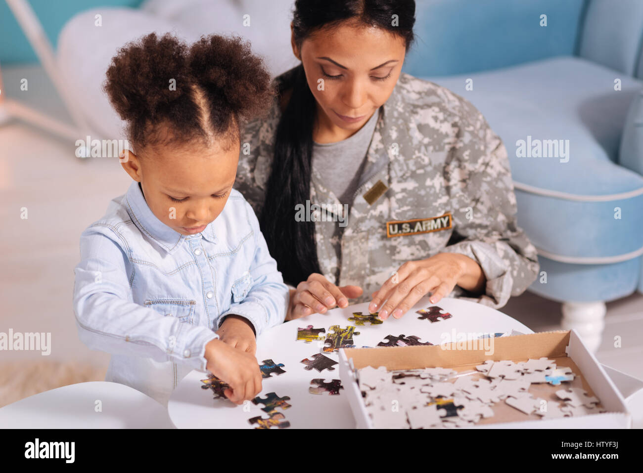 Focused ladies looking for a perfect match Stock Photo - Alamy