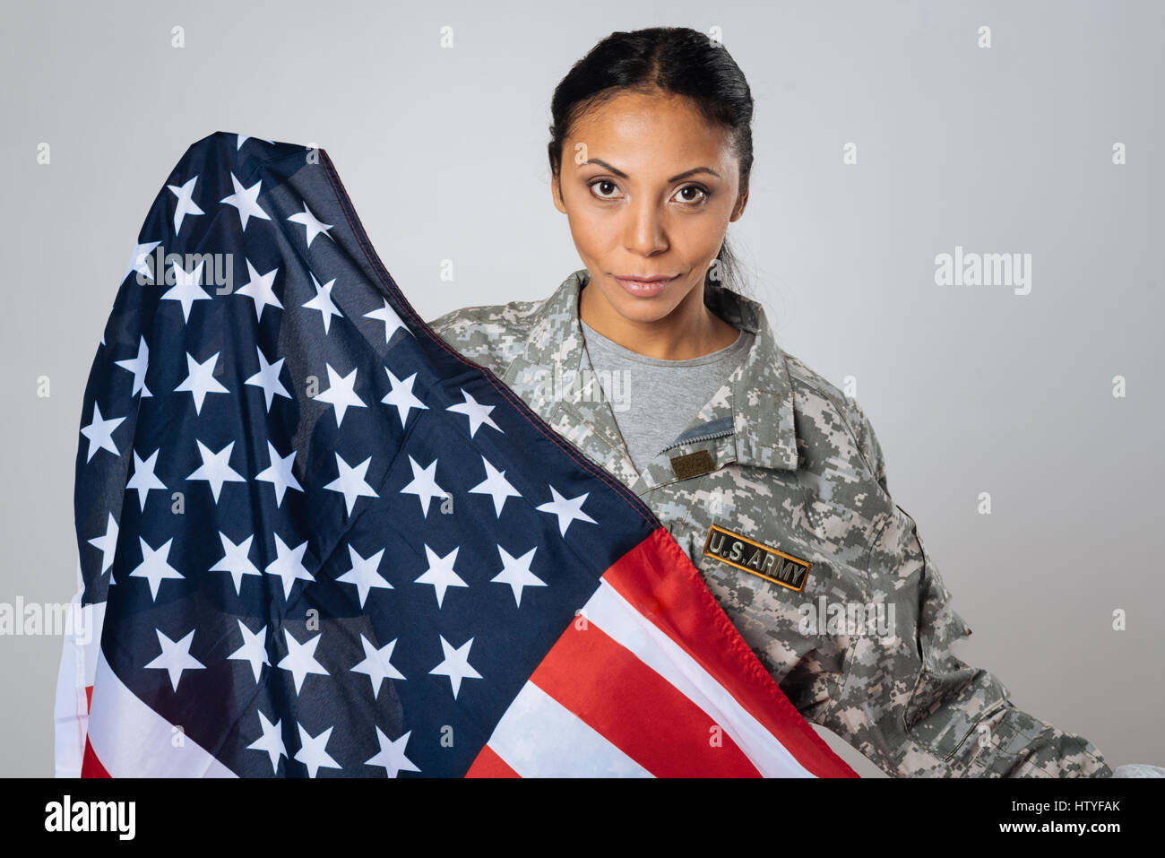 Graceful patriotic lady posing with a flag Stock Photo - Alamy