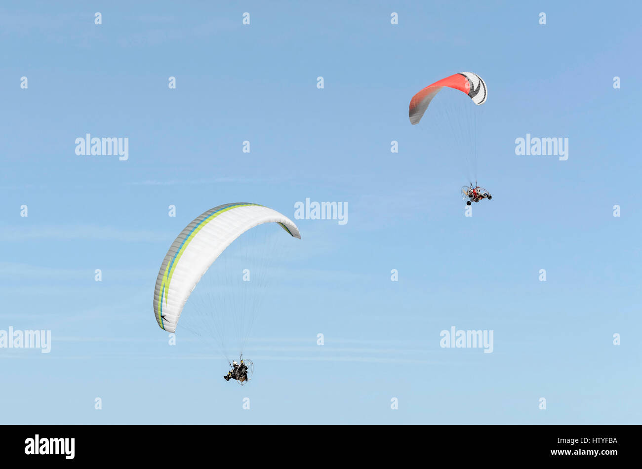 Spanish army soldiers (C. VENTURY group), in paramotor, are doing an ...