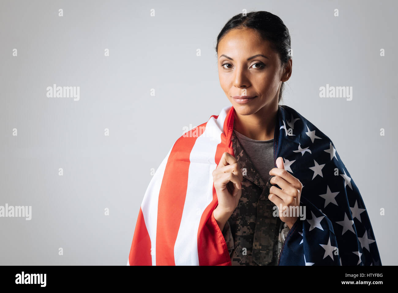 Charismatic brave lady wrapped in the flag Stock Photo - Alamy