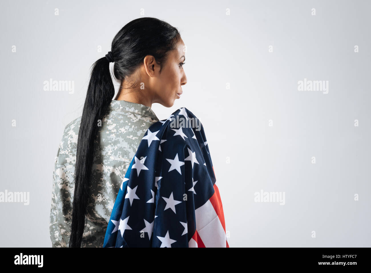 Fearless strong woman posing for military advertisement campaign Stock ...