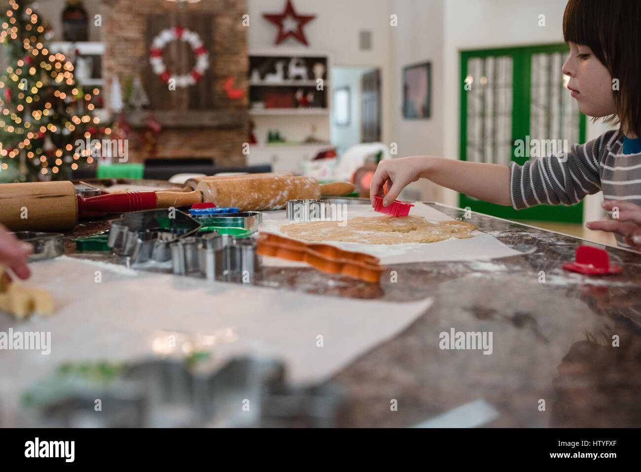 Girl making Christmas cookies Stock Photo - Alamy