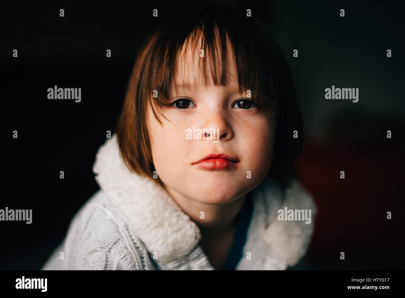 Portrait of a girl pouting Stock Photo - Alamy