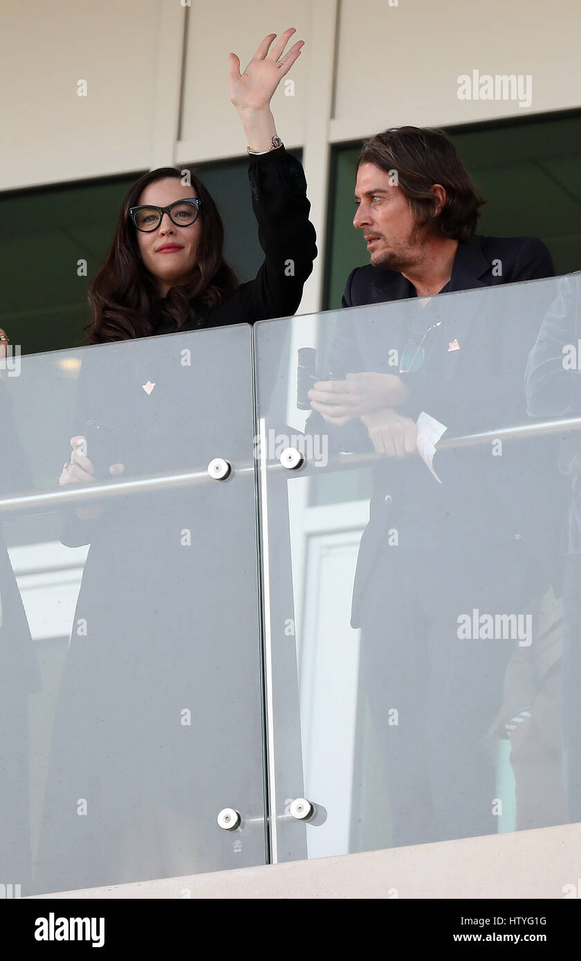 Liv Tyler waves during Ladies Day of the 2017 Cheltenham Festival at ...