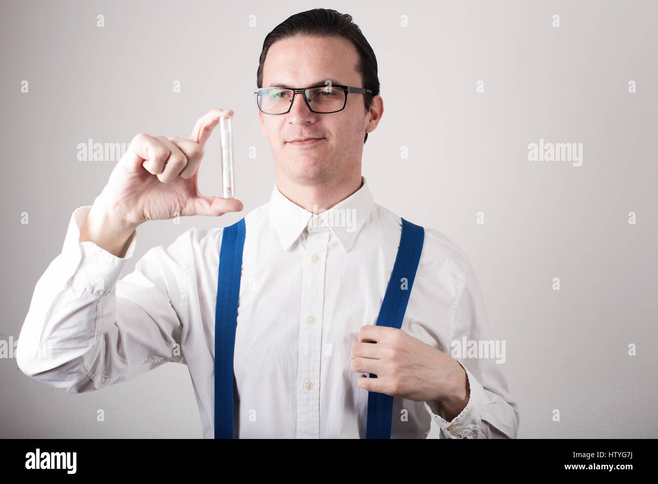 Researcher holding test tube hi-res stock photography and images - Alamy
