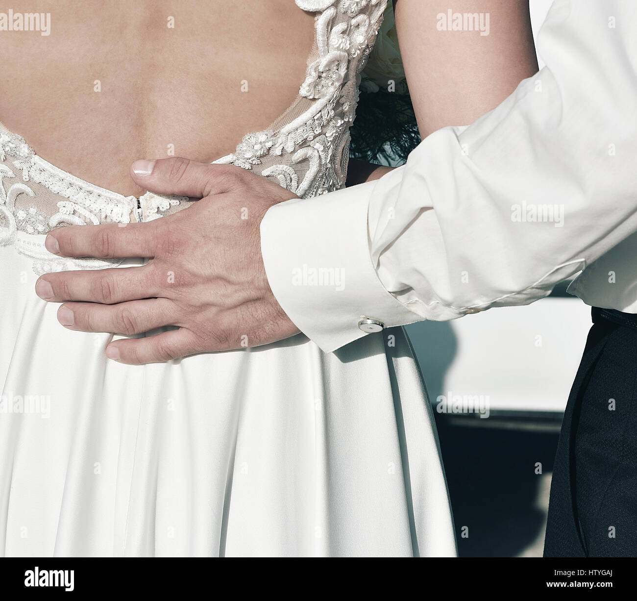 Two women hand on back hi-res stock photography and images - Alamy