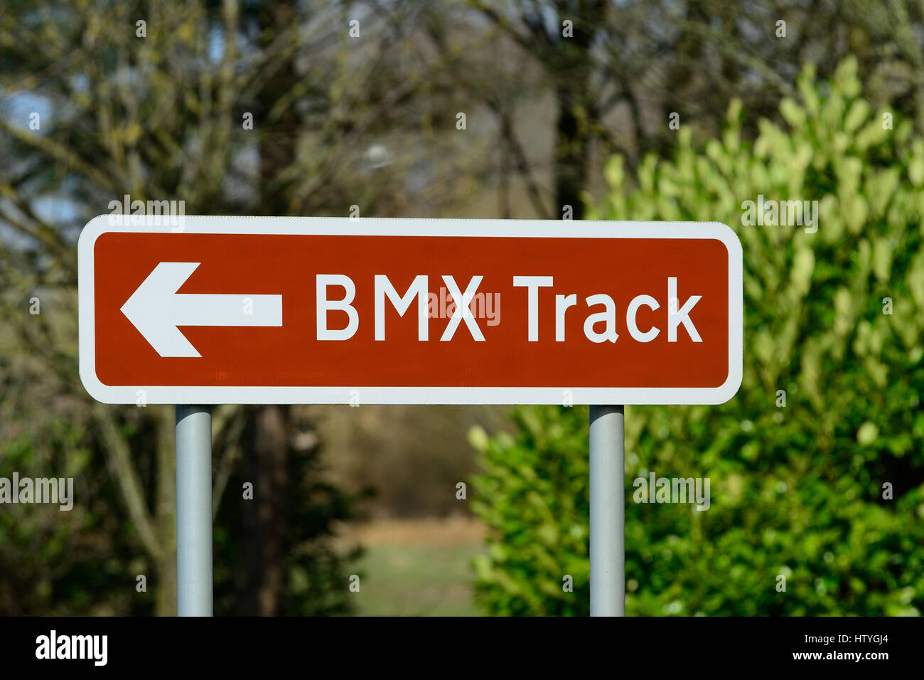 Sign pointing to BMX Track Stock Photo - Alamy