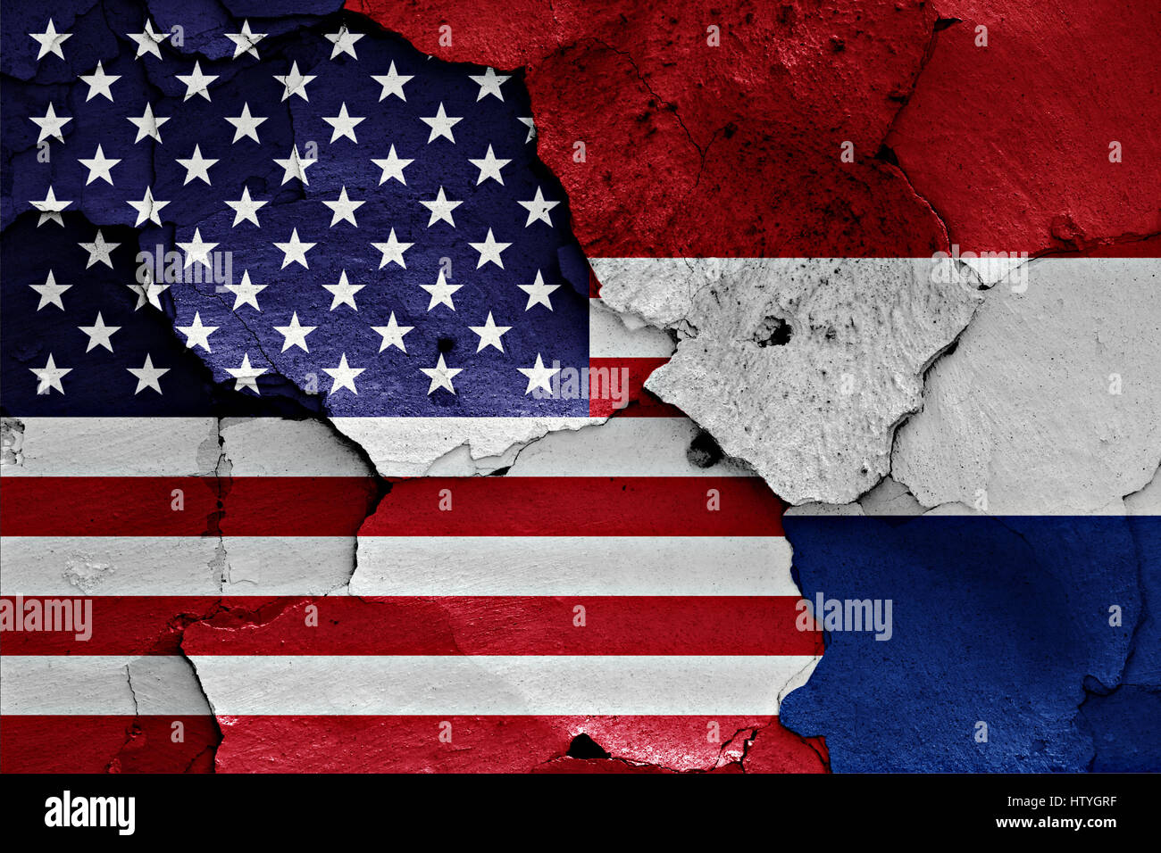 flags of USA and Netherlands painted on cracked wall Stock Photo - Alamy