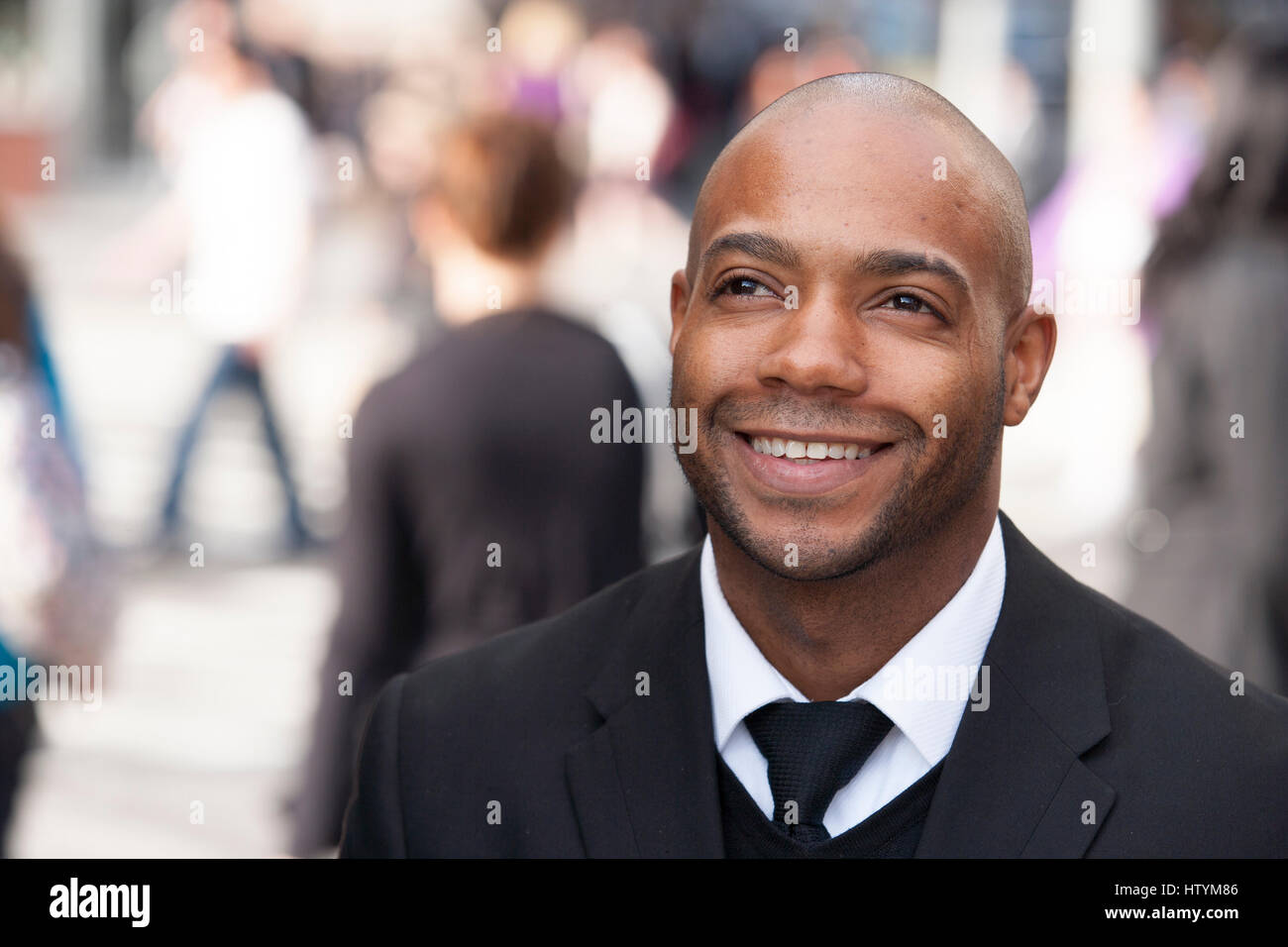 Portrait of pedestrian in city Stock Photo - Alamy