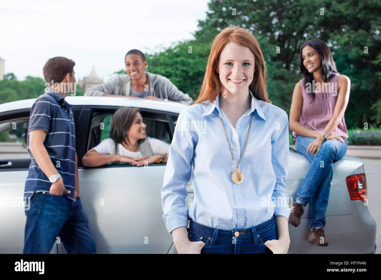Teenagers with car Stock Photo - Alamy