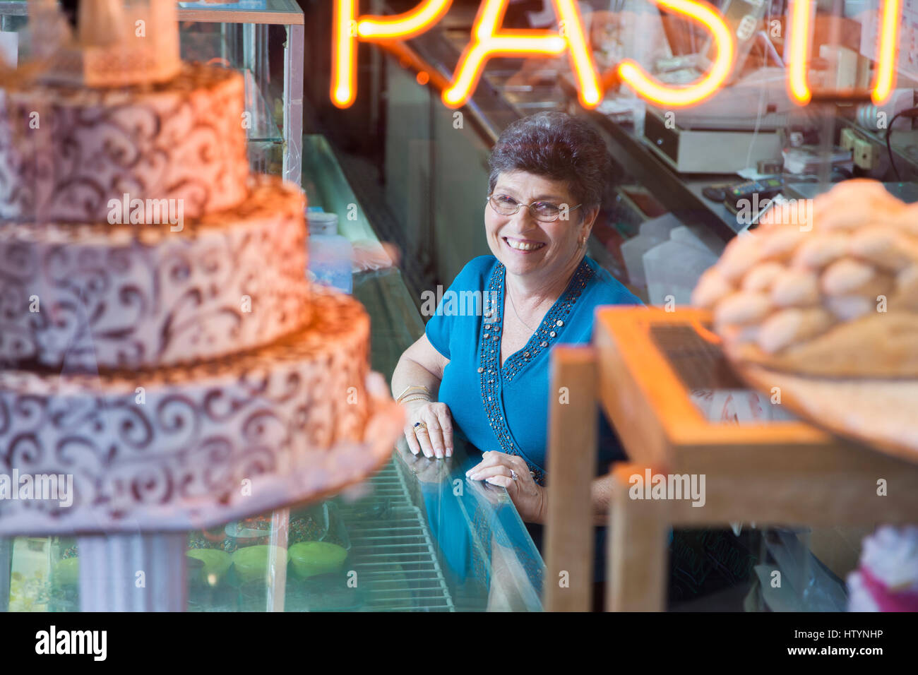Bakery shop owner Stock Photo - Alamy