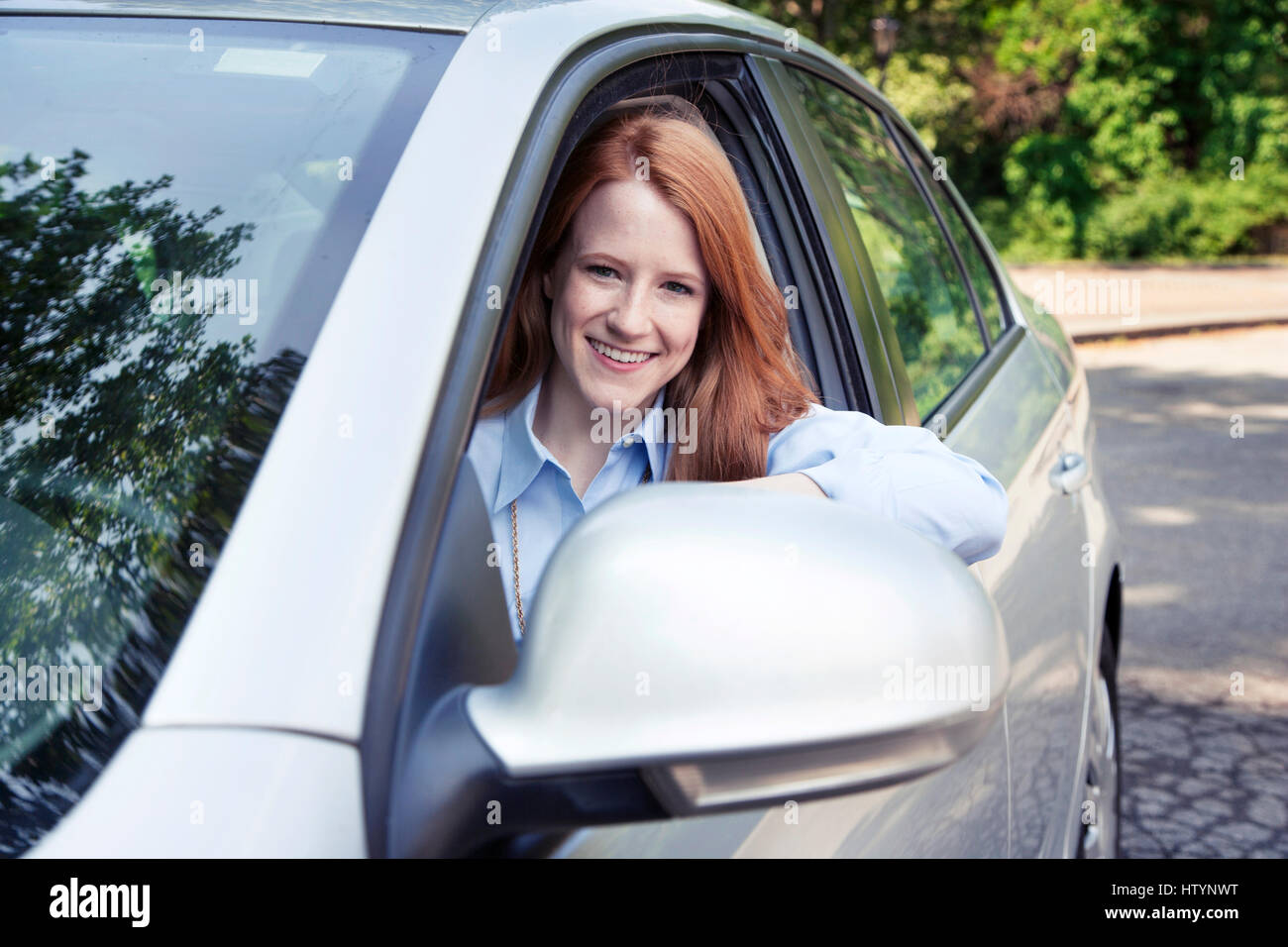 Teenager girl with car Stock Photo - Alamy