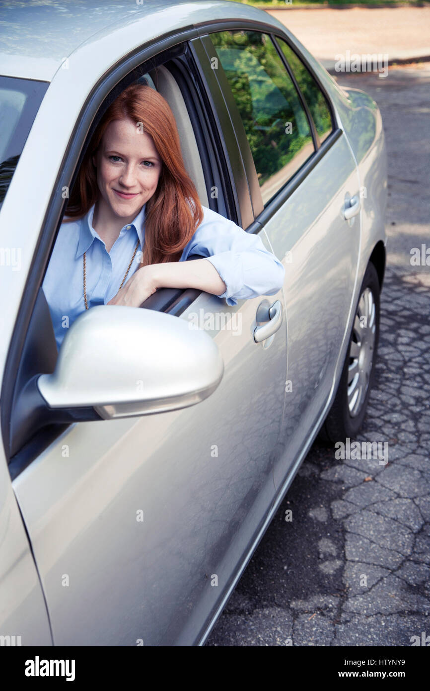 Teenager girl with car Stock Photo - Alamy