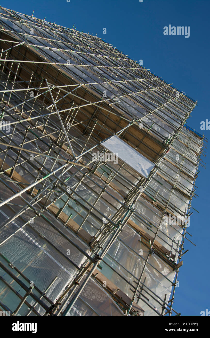 view looking up at the construction of temporary scaffolding structure ...
