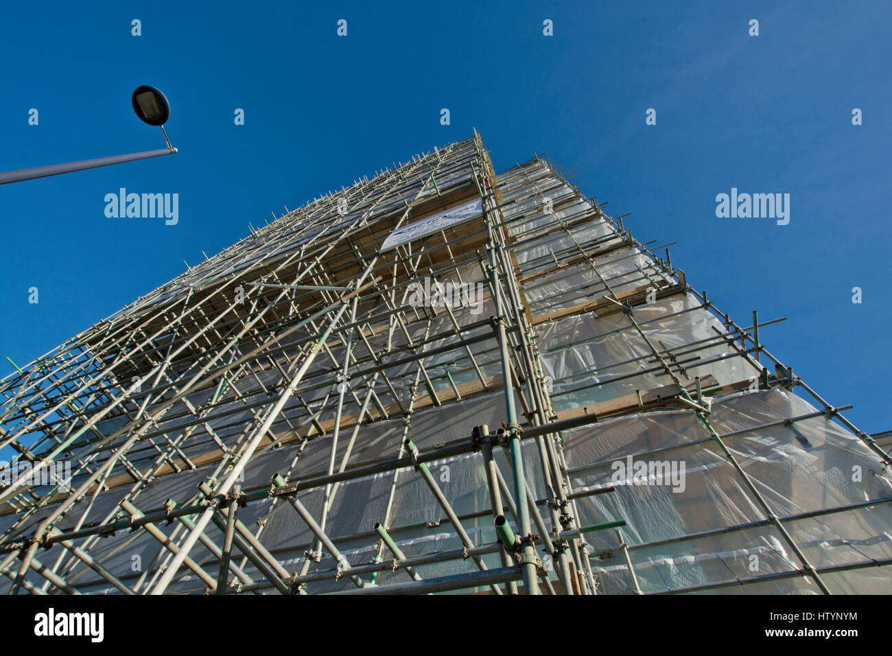 view looking up at the construction of temporary scaffolding structure ...