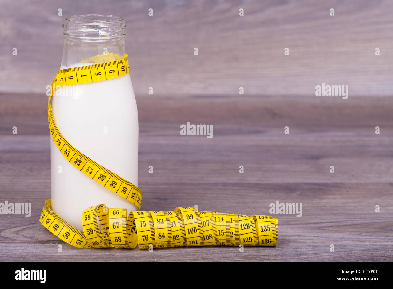 Fitness concept with the kefir yogurt on a wooden background Stock ...