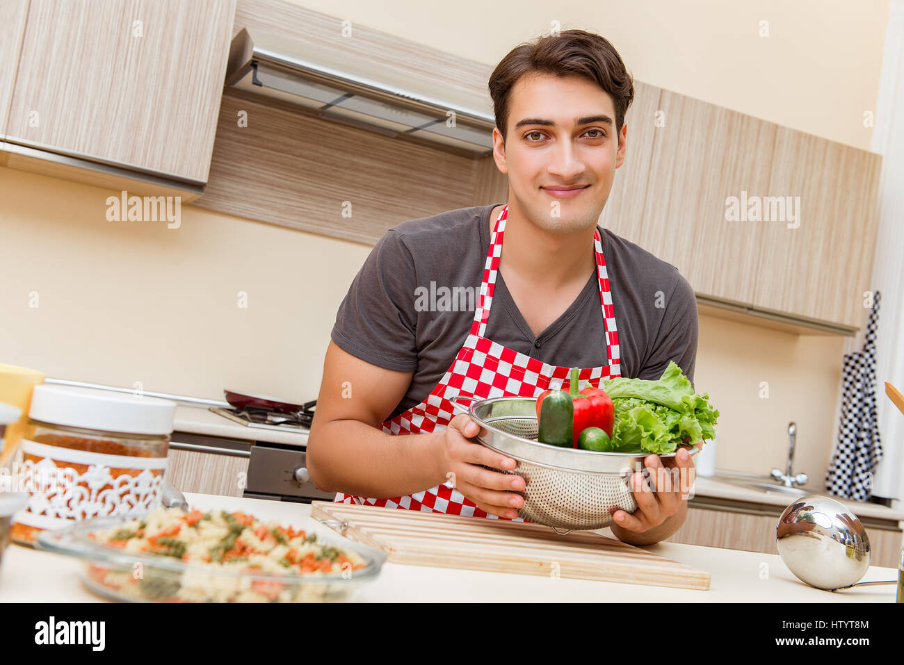 Man male cook preparing food in kitchen Stock Photo - Alamy