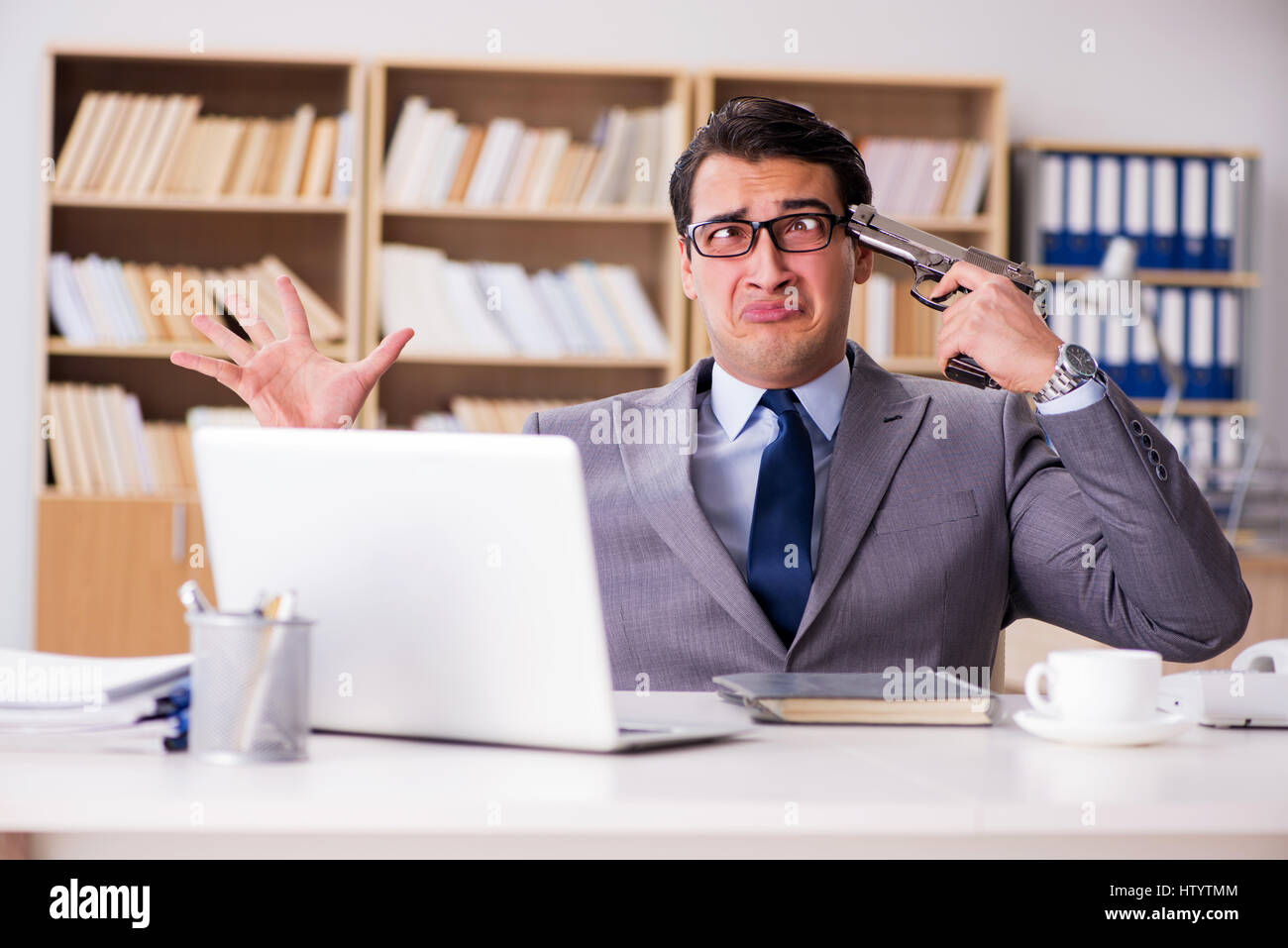 Angry businessman working in the office Stock Photo - Alamy