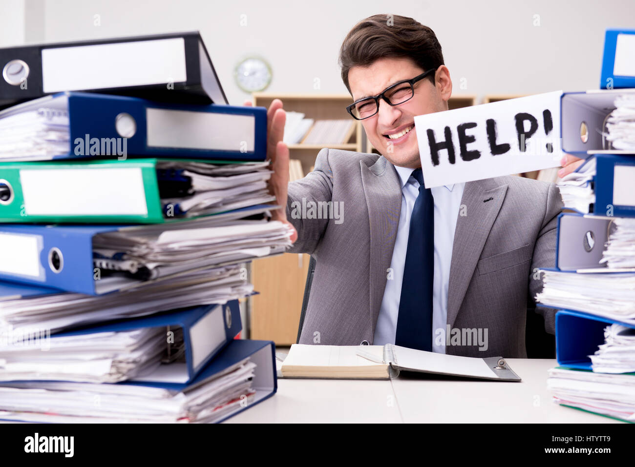 Busy businessman asking for help with work Stock Photo - Alamy