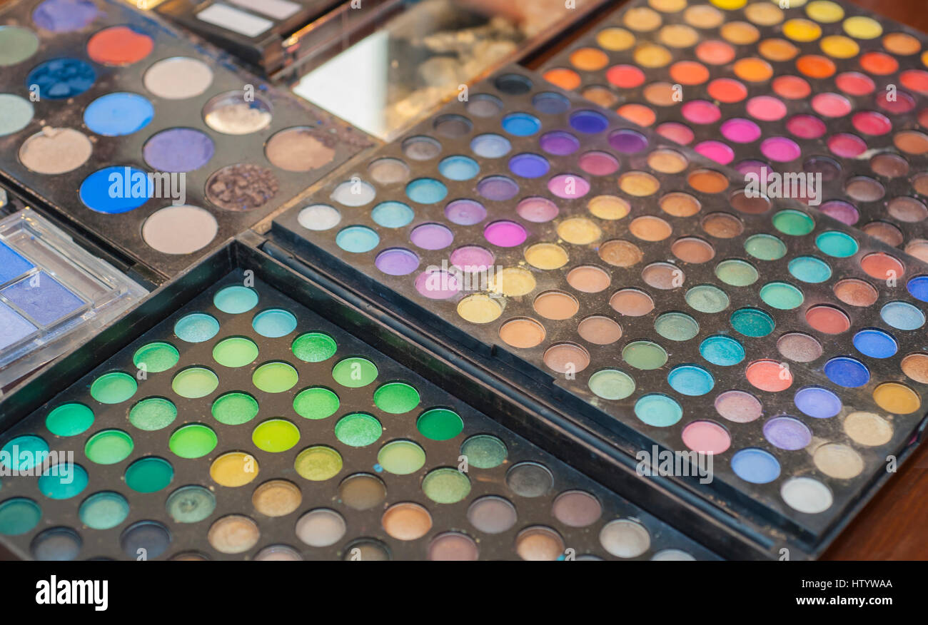 Closeup detail of multi colored color palette with eye shadow makeup ...
