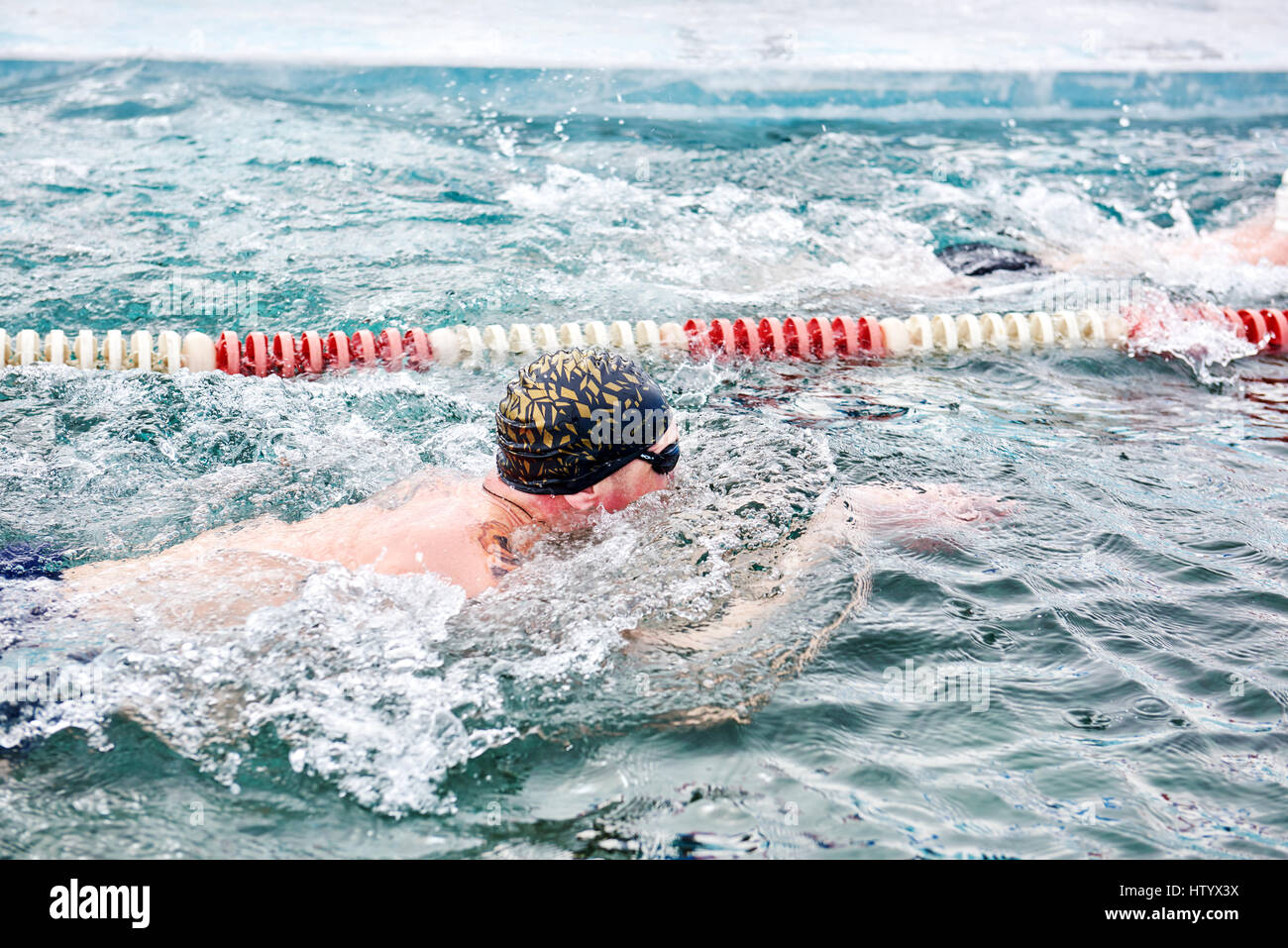 Ice hole swimming man hi-res stock photography and images - Alamy