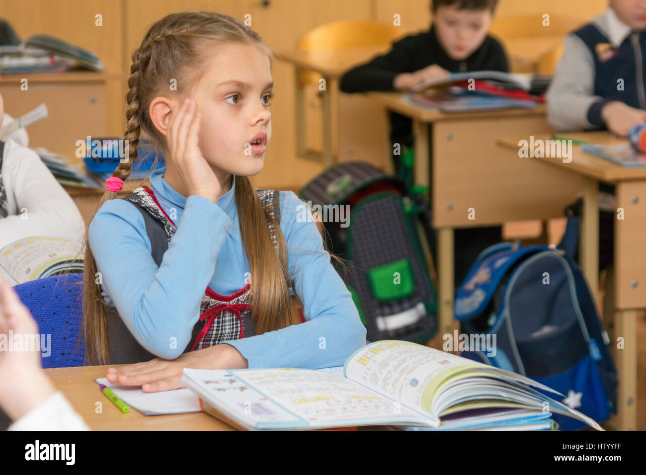 Child raising right hand hi-res stock photography and images - Alamy