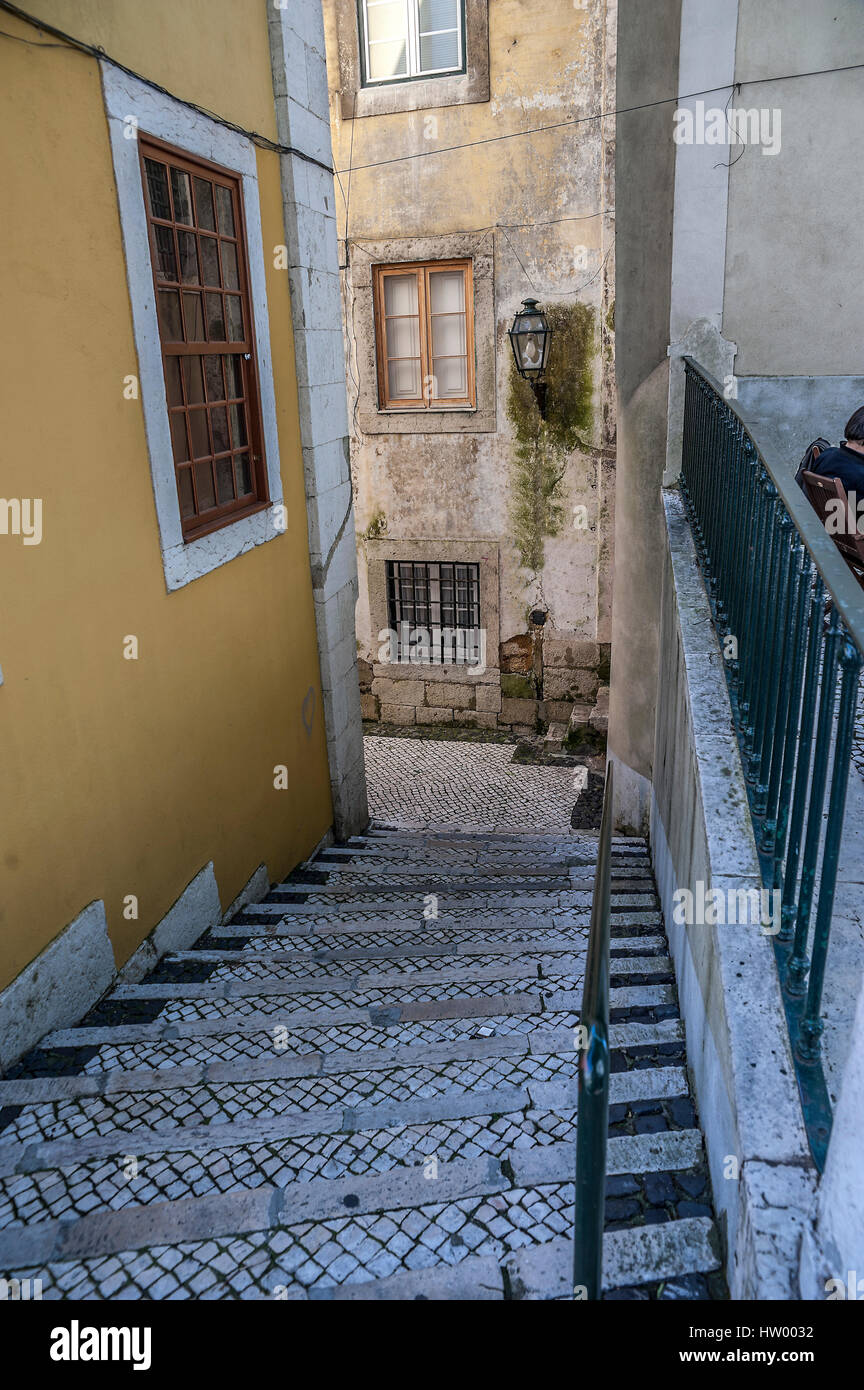 Portugal , Lisbon . The medieval quarters of the city . The narrow ...