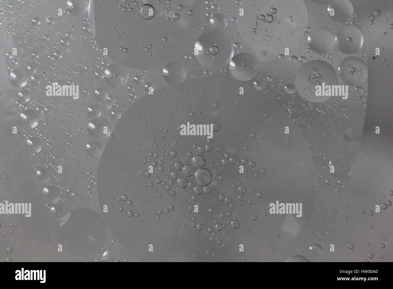 Oil and water bubble patterns in monochrome Stock Photo - Alamy