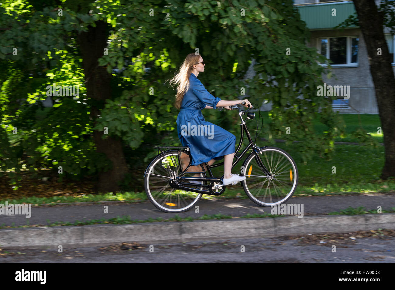 Beautiful young woman and vintage bicycle, summer. Red hair girl riding ...
