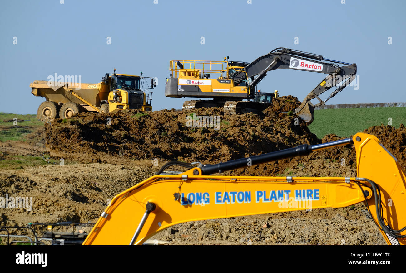 Heavy machinery used in the preparation of land for house building ...