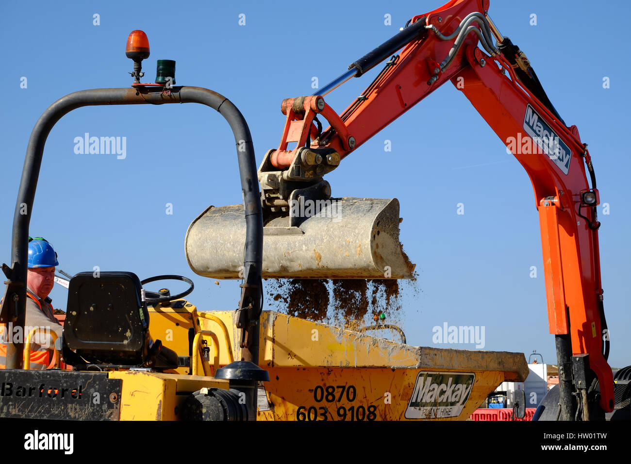 Heavy machinery used in the preparation of land for house building ...